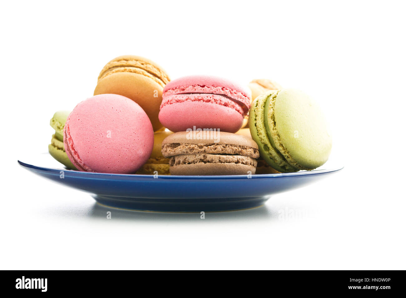 Tasty sweet macarons. Macaroons on plate Stock Photo - Alamy