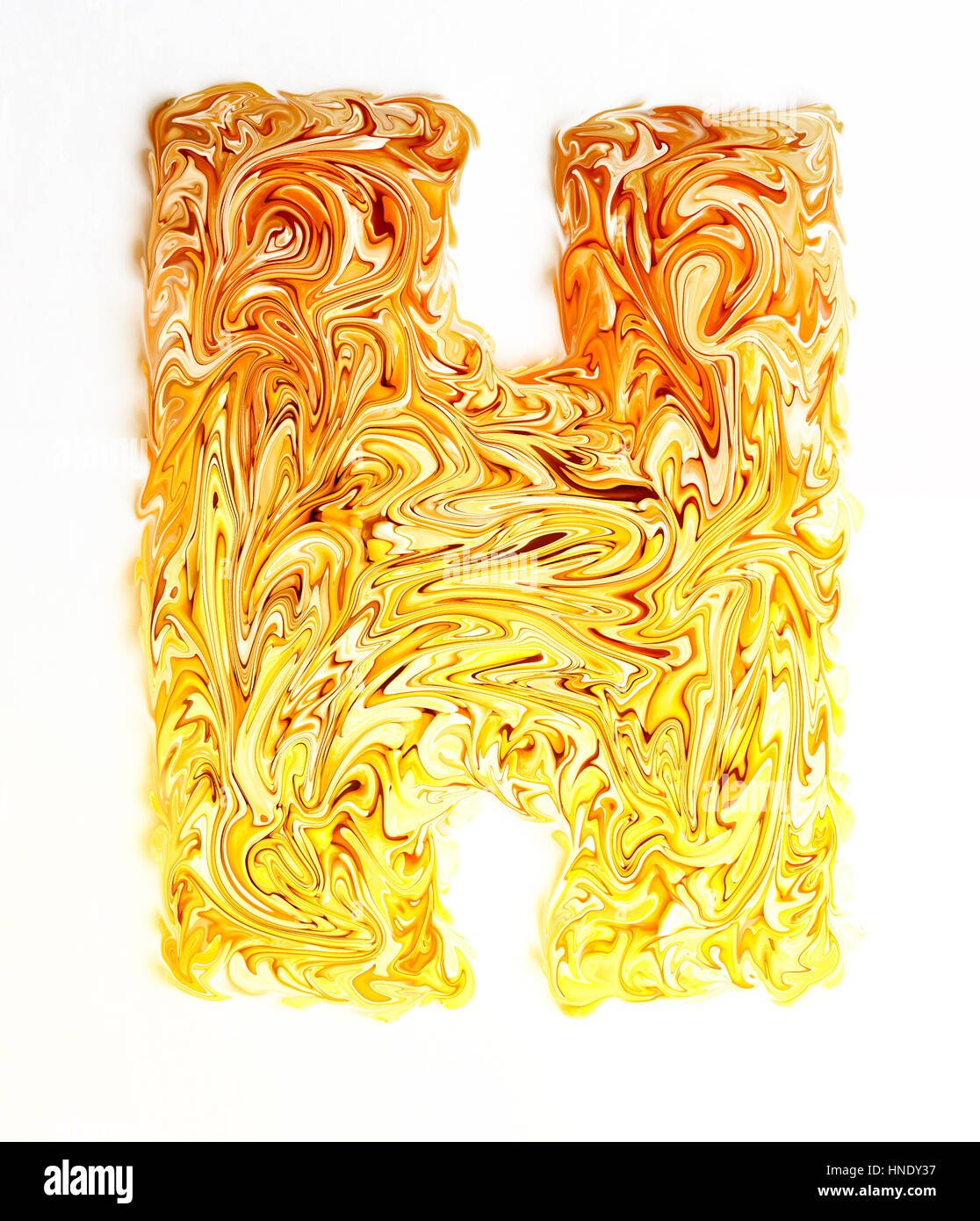 The yellow candy letter H Stock Photo - Alamy