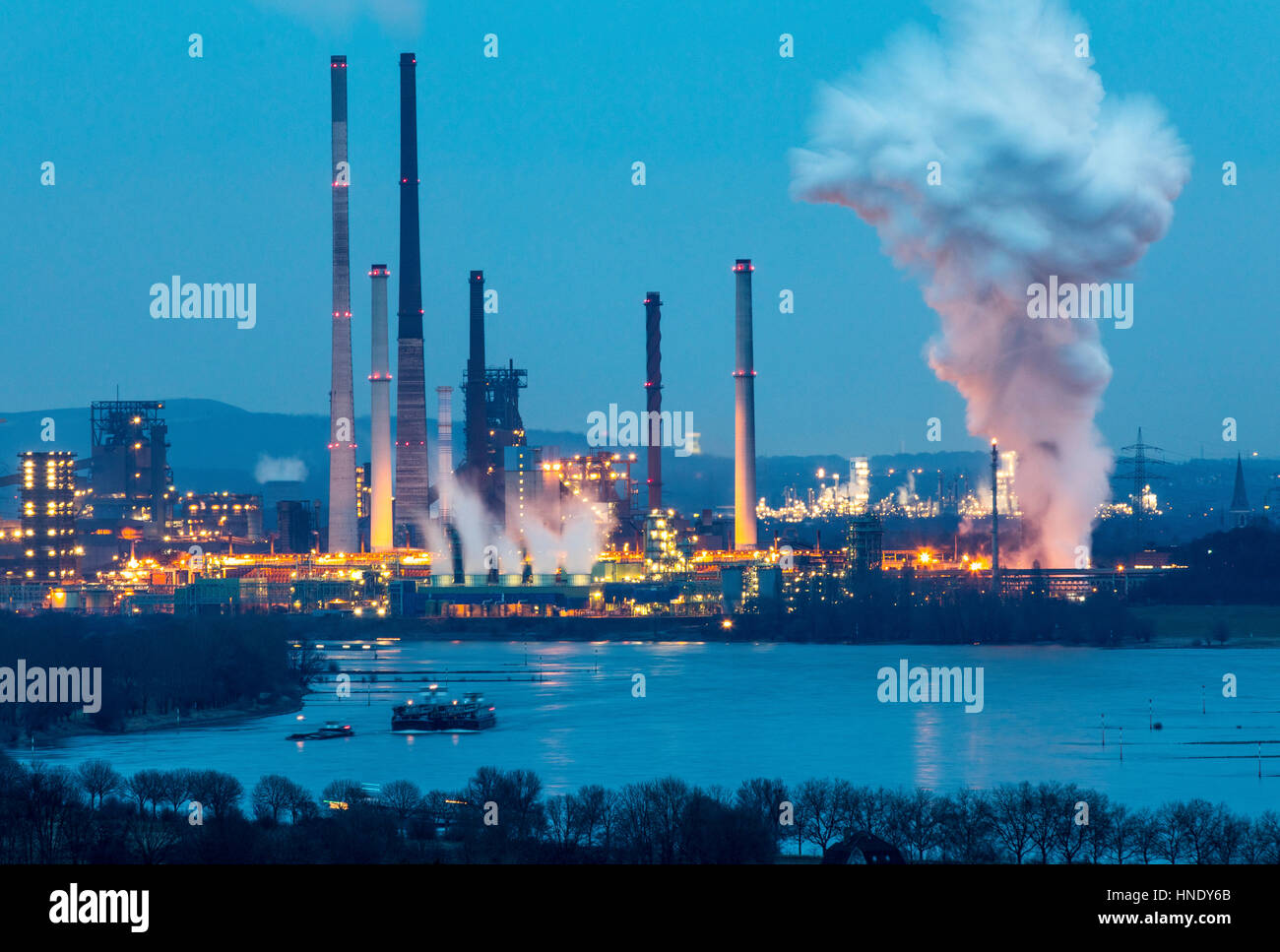 Freight ships on the Rhine near Duisburg, ThyssenKrupp steelworks in ...