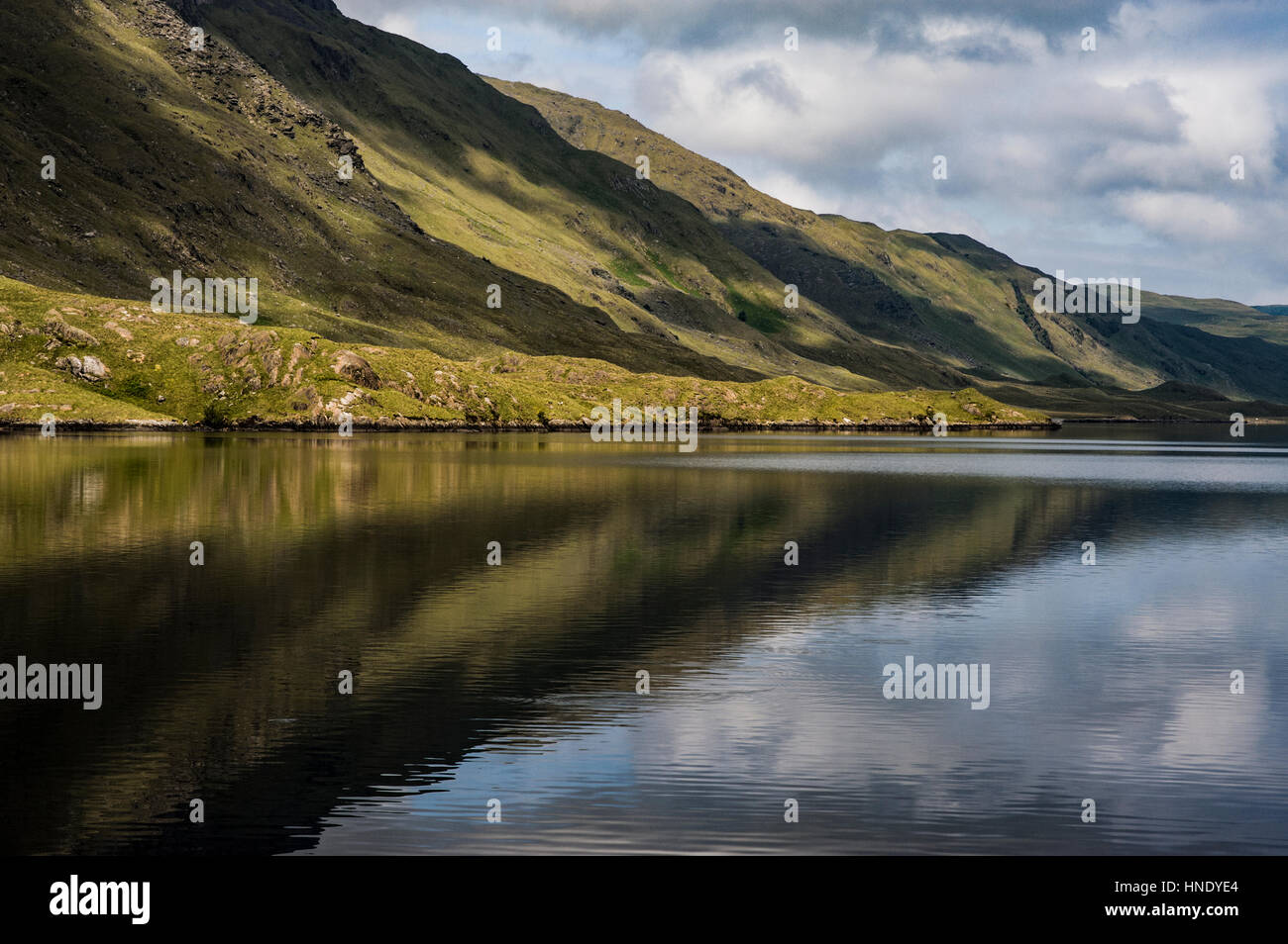 Mountains reflected in Doo Lough, Doolough, County Mayo, Connemara ...
