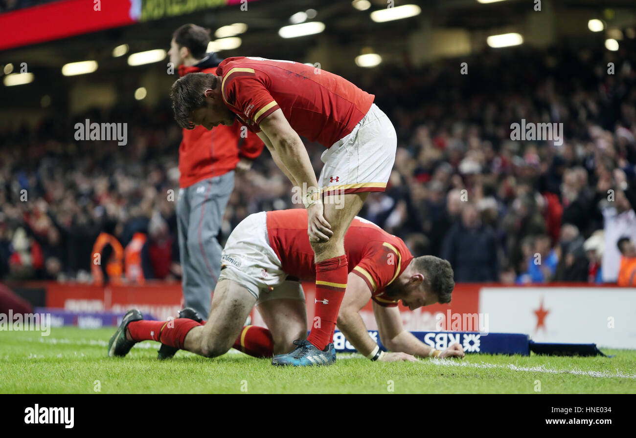 Wales Dan Biggar and Alex Cuthbert are dejected after Elliot Daly's try ...