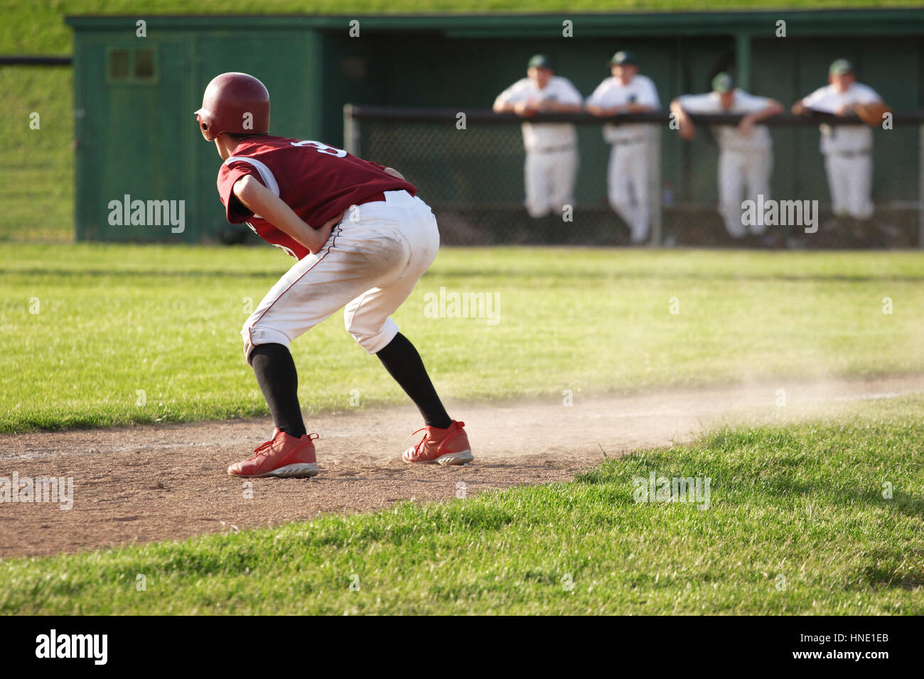 Baseball runner on base Stock Photo - Alamy