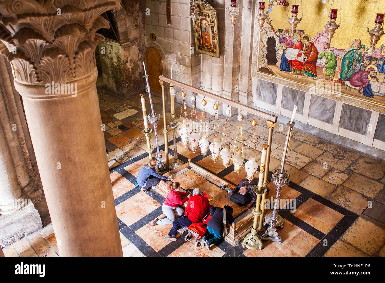 Stone of Unction and Mosaic artwork of the death of Jesus Christ ...