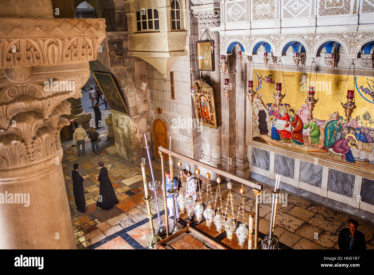 Stone of Unction and Mosaic artwork of the death of Jesus Christ ...