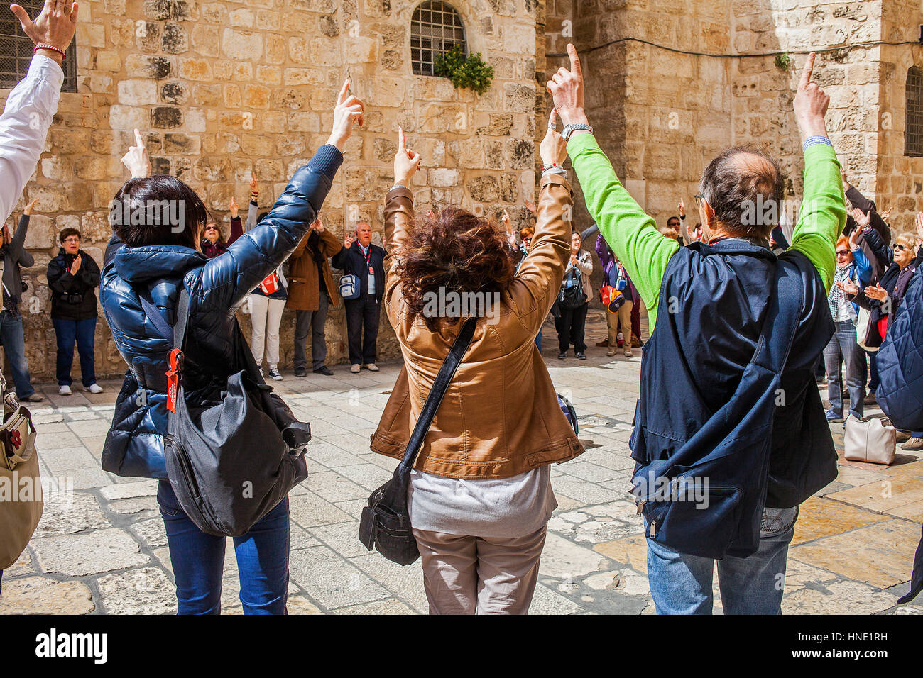 Pilgrims following Jesus' steps on the Via Dolorosa, in exterior of ...