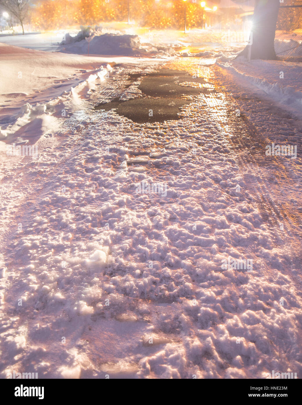 Frozen winter road covered in ice and snow Stock Photo - Alamy