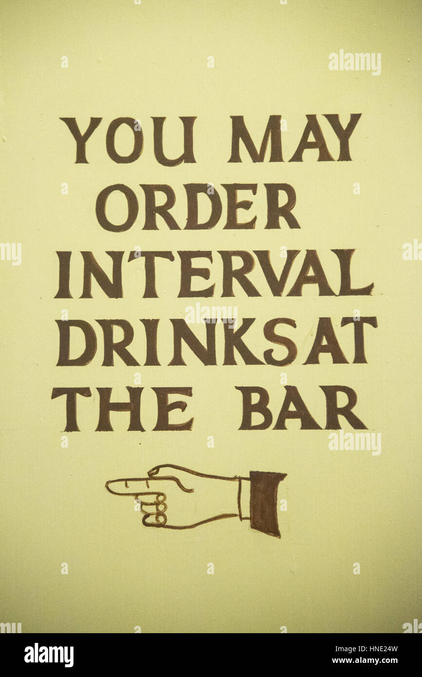 A bar sign in a theatre in England, UK Stock Photo - Alamy