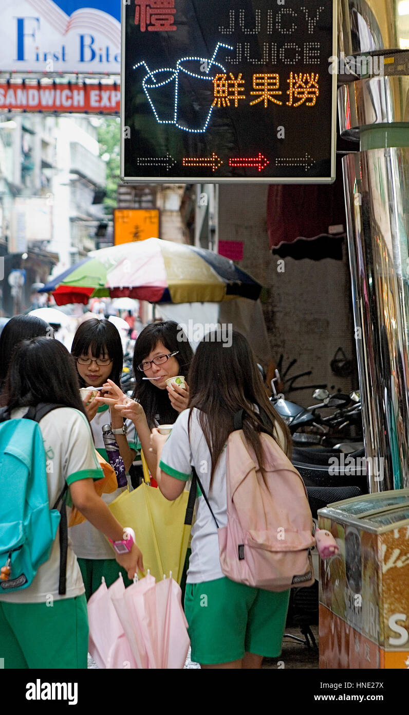 Street scene, Girls, Students in Rua de Monte,Macau,China Stock Photo ...