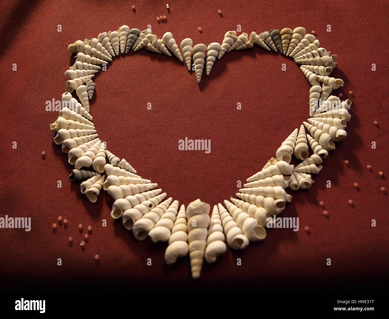 Heart made shells on beach hi-res stock photography and images - Alamy