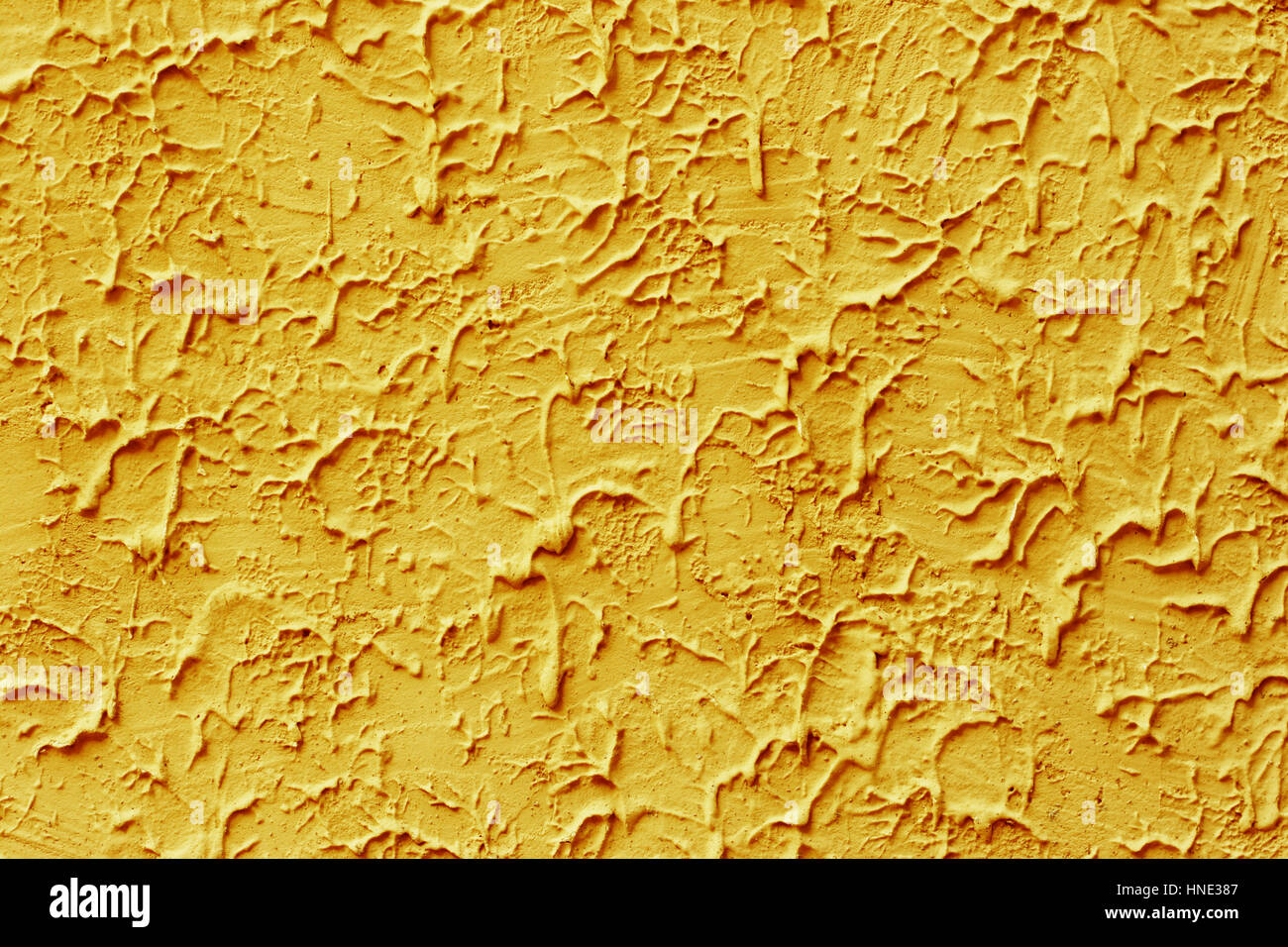 yellow stucco wall Stock Photo - Alamy