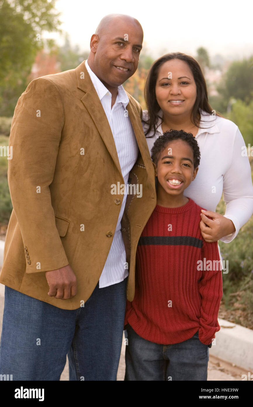 Portrait of happy multicultural family smiling Stock Photo - Alamy