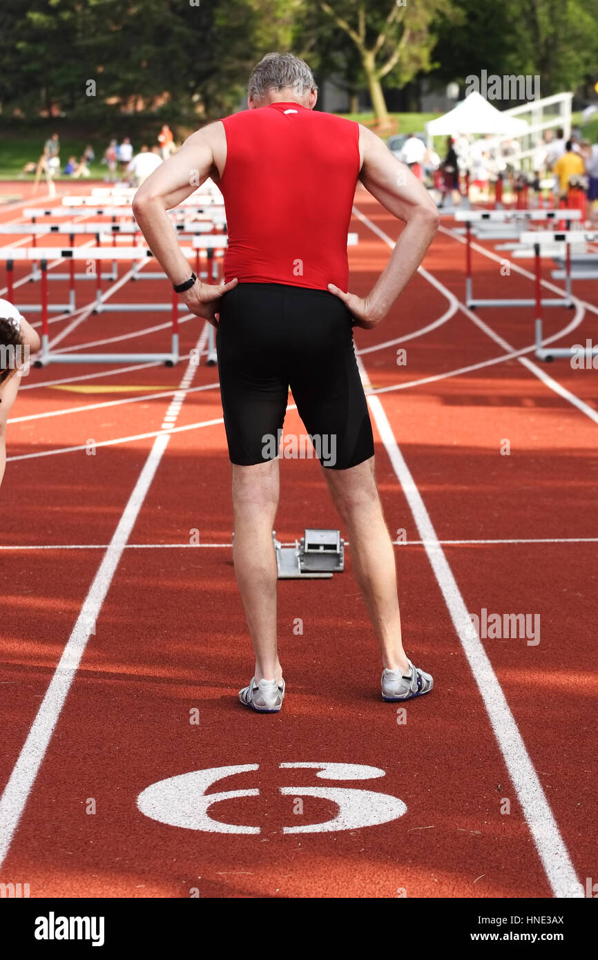 Runner on track before a race Stock Photo - Alamy