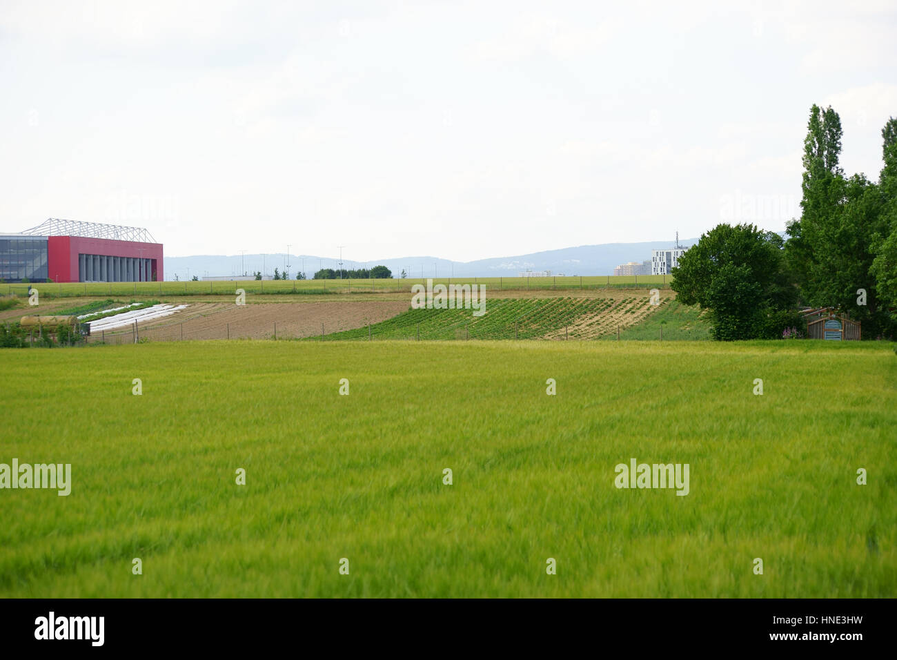 Meadows and fields as well as mountains and infrastructure at the ...