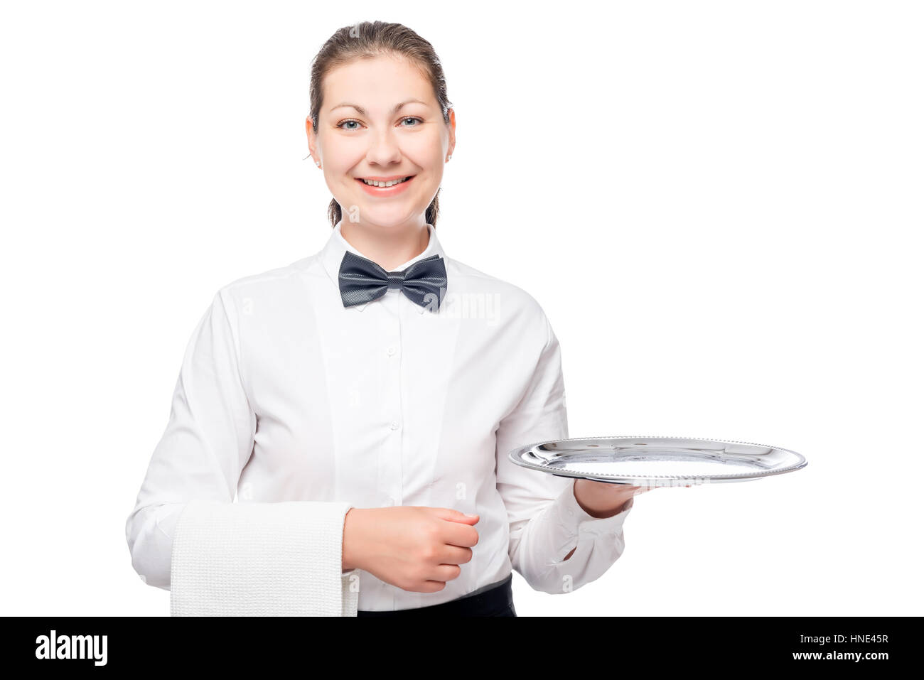 confident waiter with a tray in the studio posing Stock Photo - Alamy