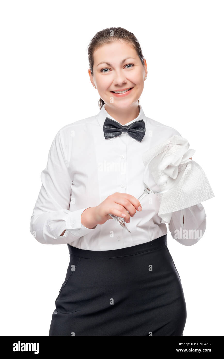 Happy waitress in uniform with a glass of wine and a napkin on a white ...
