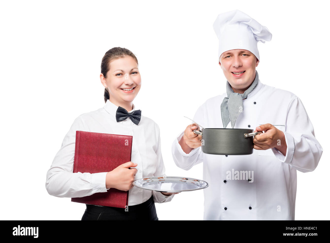 chef with a pot of soup and a waitress with a tray on a white ...