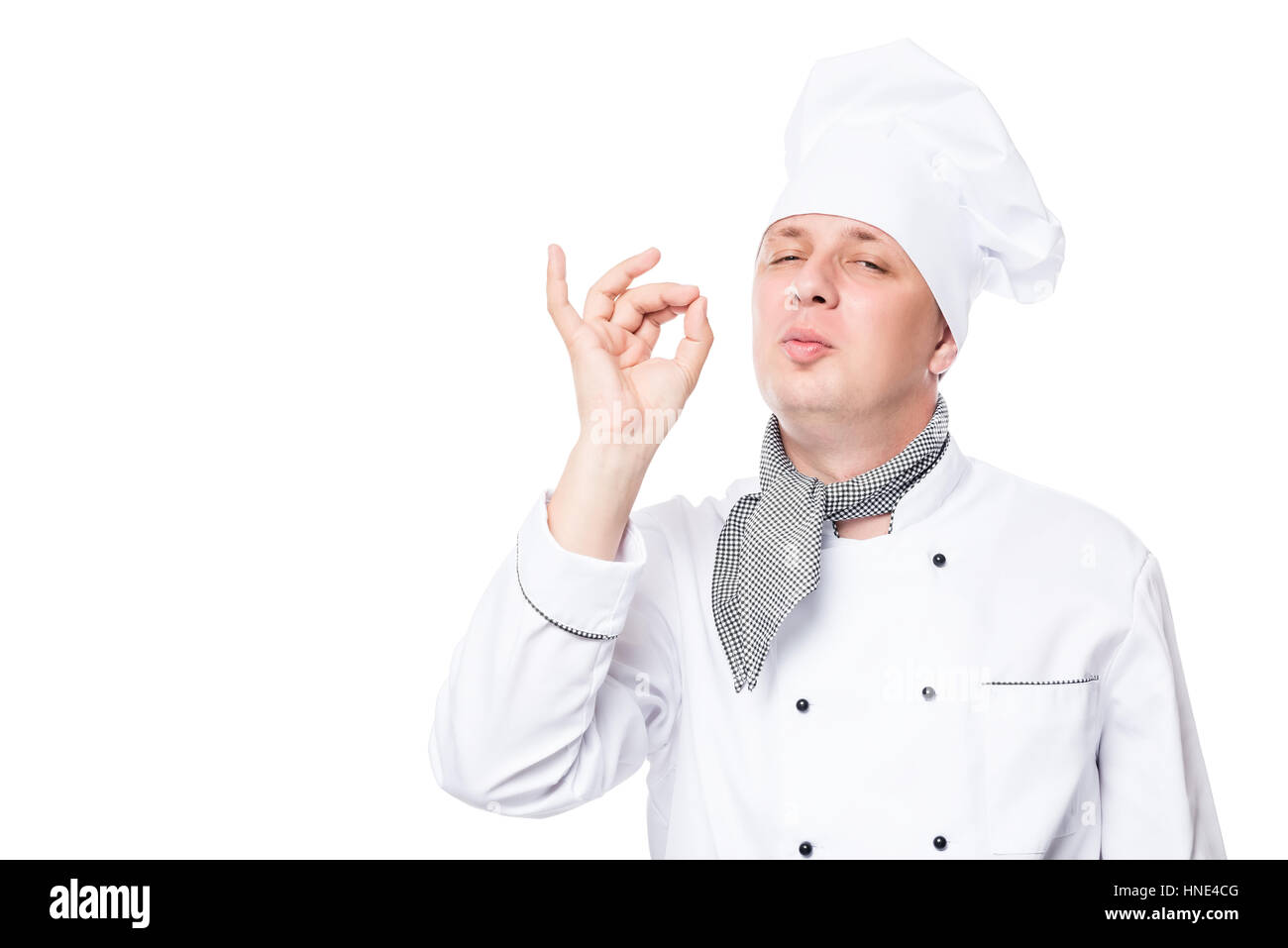 Male chef showing gesture delicious, on a white background Stock Photo ...