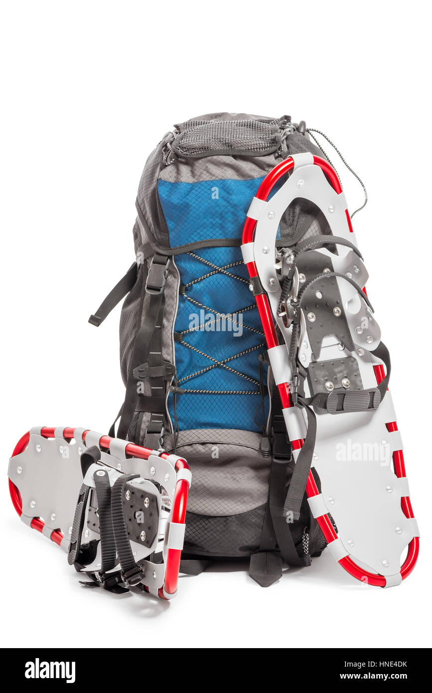 a pair of snowshoes and backpack traveler in the winter Stock Photo - Alamy