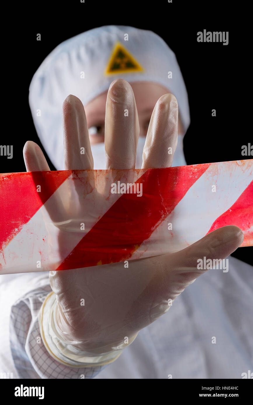 Do not enter! DANGEROUS AREA! Hand close-up Stock Photo - Alamy