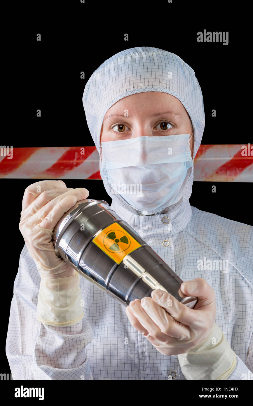 lab worker with a container for the collection of radioactive ...