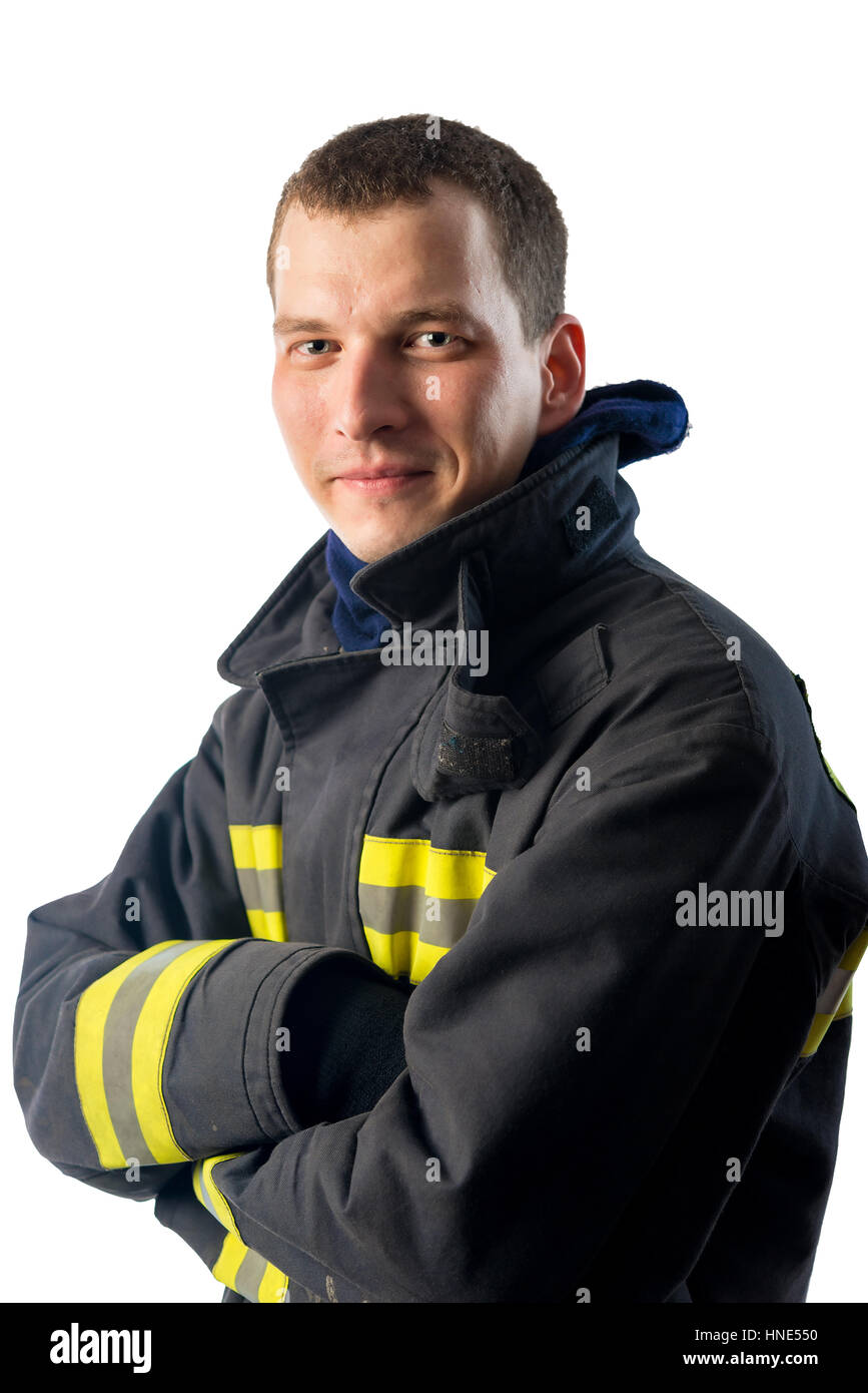 confident young Fireman on white background in studio Stock Photo - Alamy