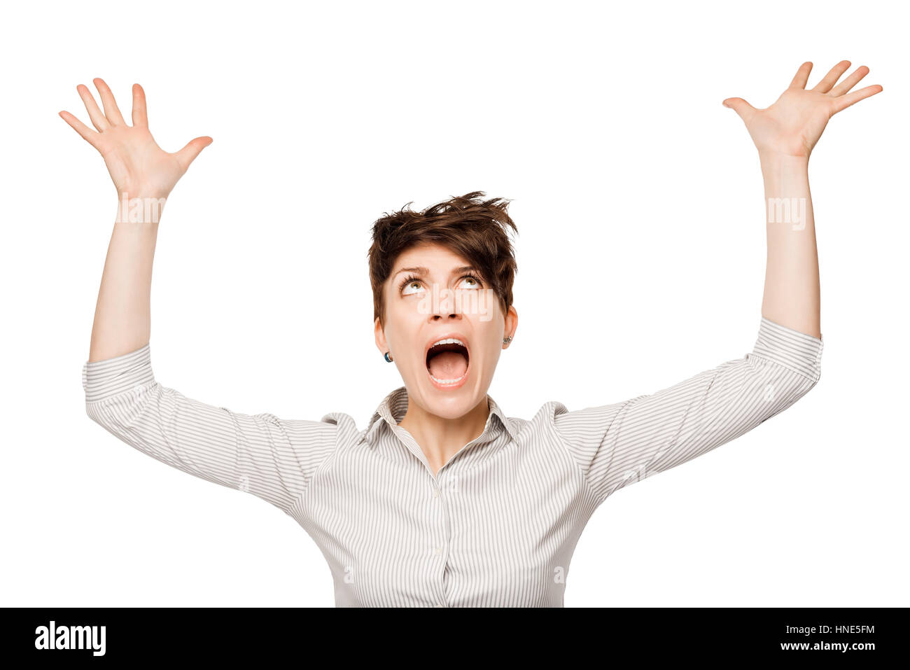Woman posing in a panic on a white background in studio Stock Photo - Alamy