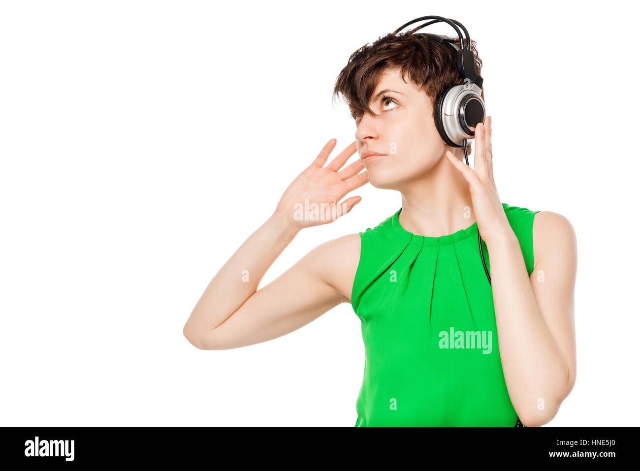 music fan woman on a white background and space to the left Stock Photo ...