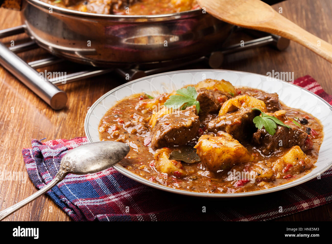 Beef stew with potatoes in a plate Stock Photo - Alamy