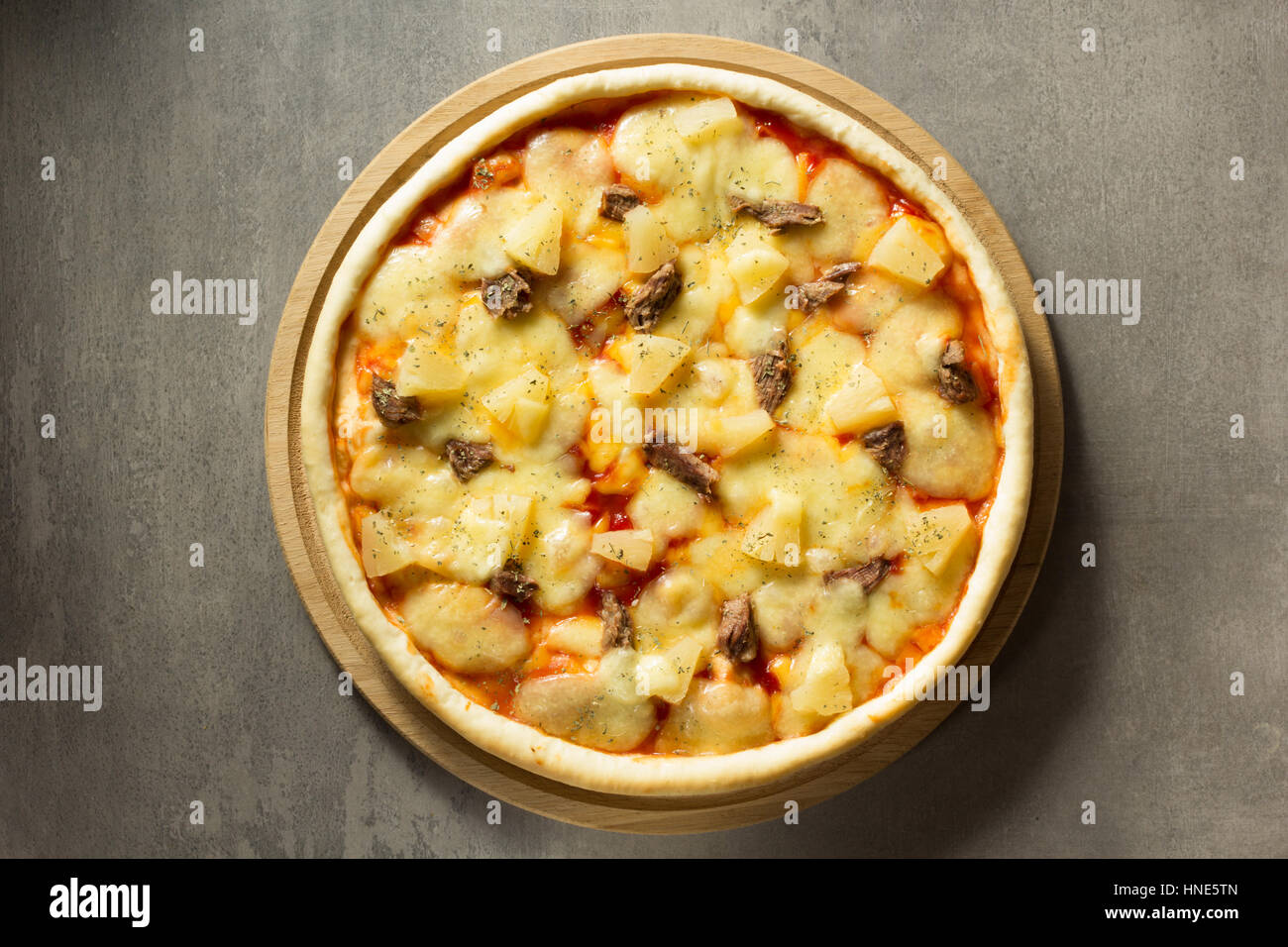 italian pizza at table background Stock Photo - Alamy