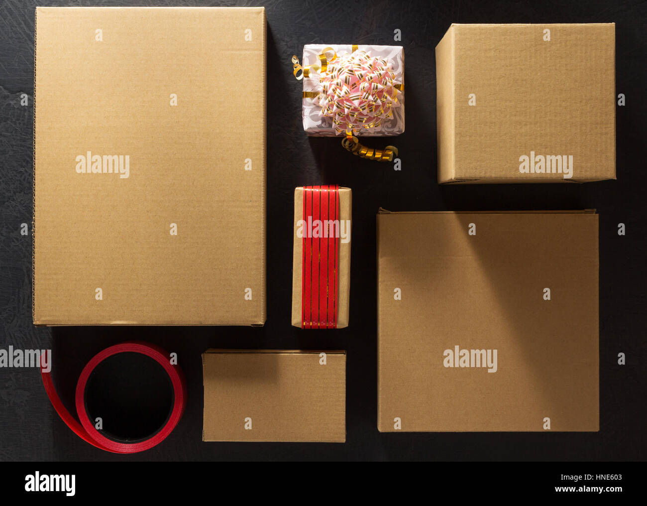 cardboard box on black background Stock Photo - Alamy