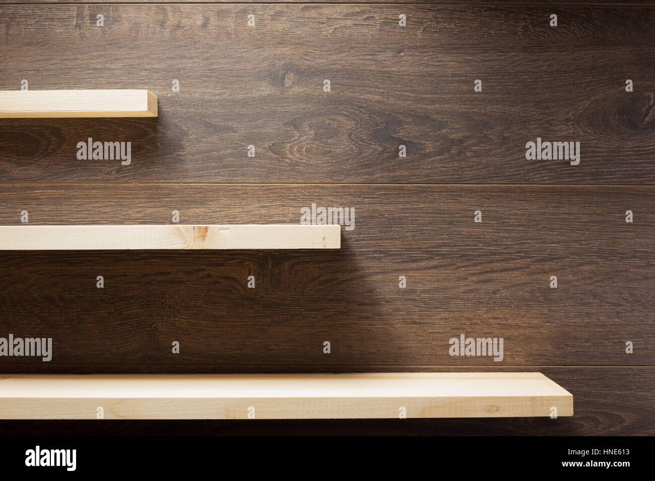 wooden shelf at brown background texture Stock Photo - Alamy