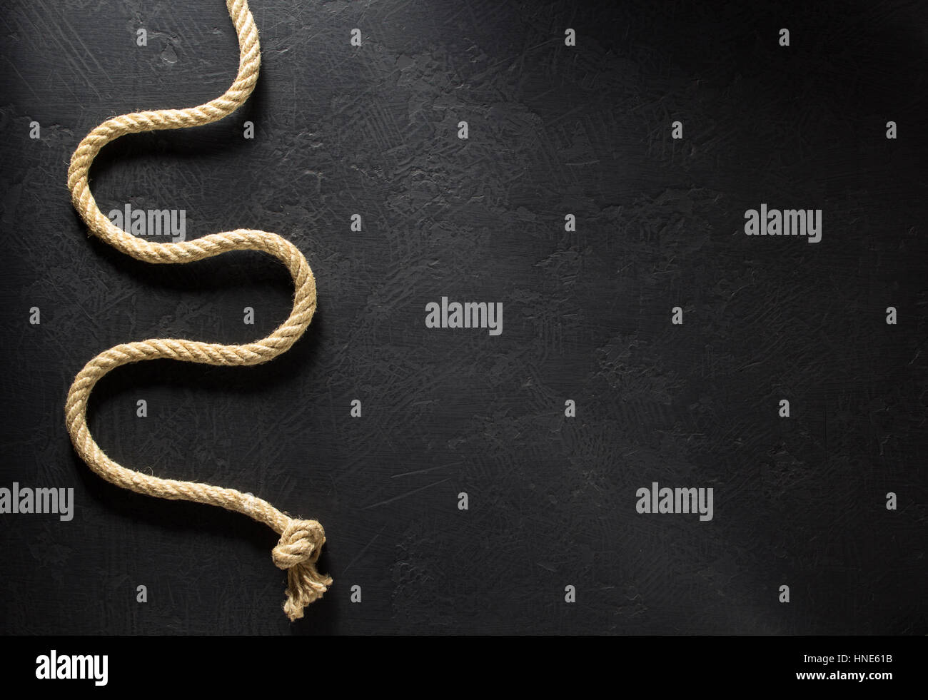 ship rope at black background texture Stock Photo - Alamy
