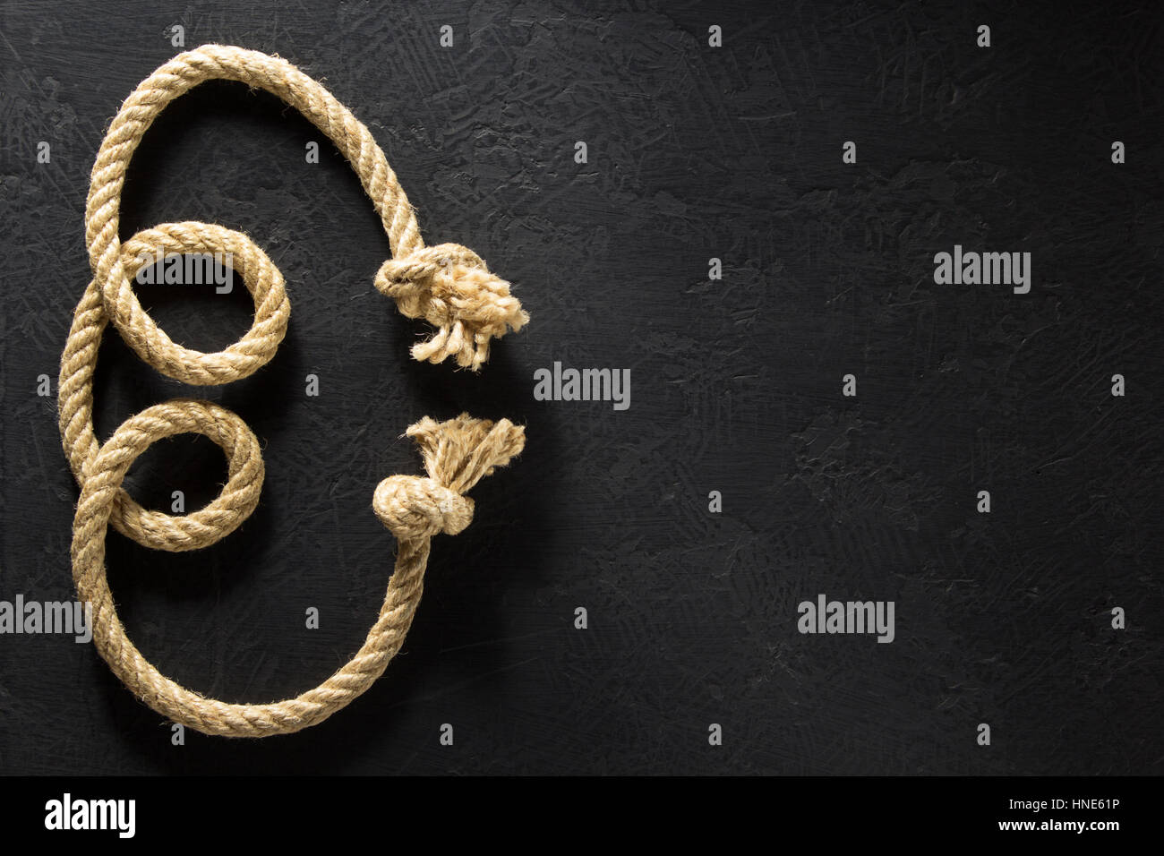 ship rope at black background texture Stock Photo - Alamy