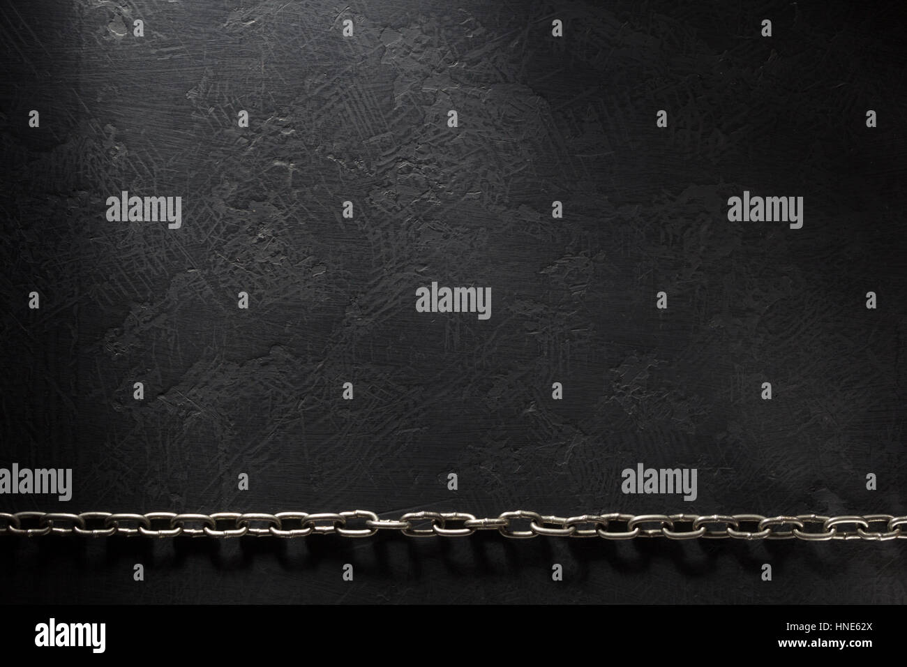metal chain on black background Stock Photo - Alamy