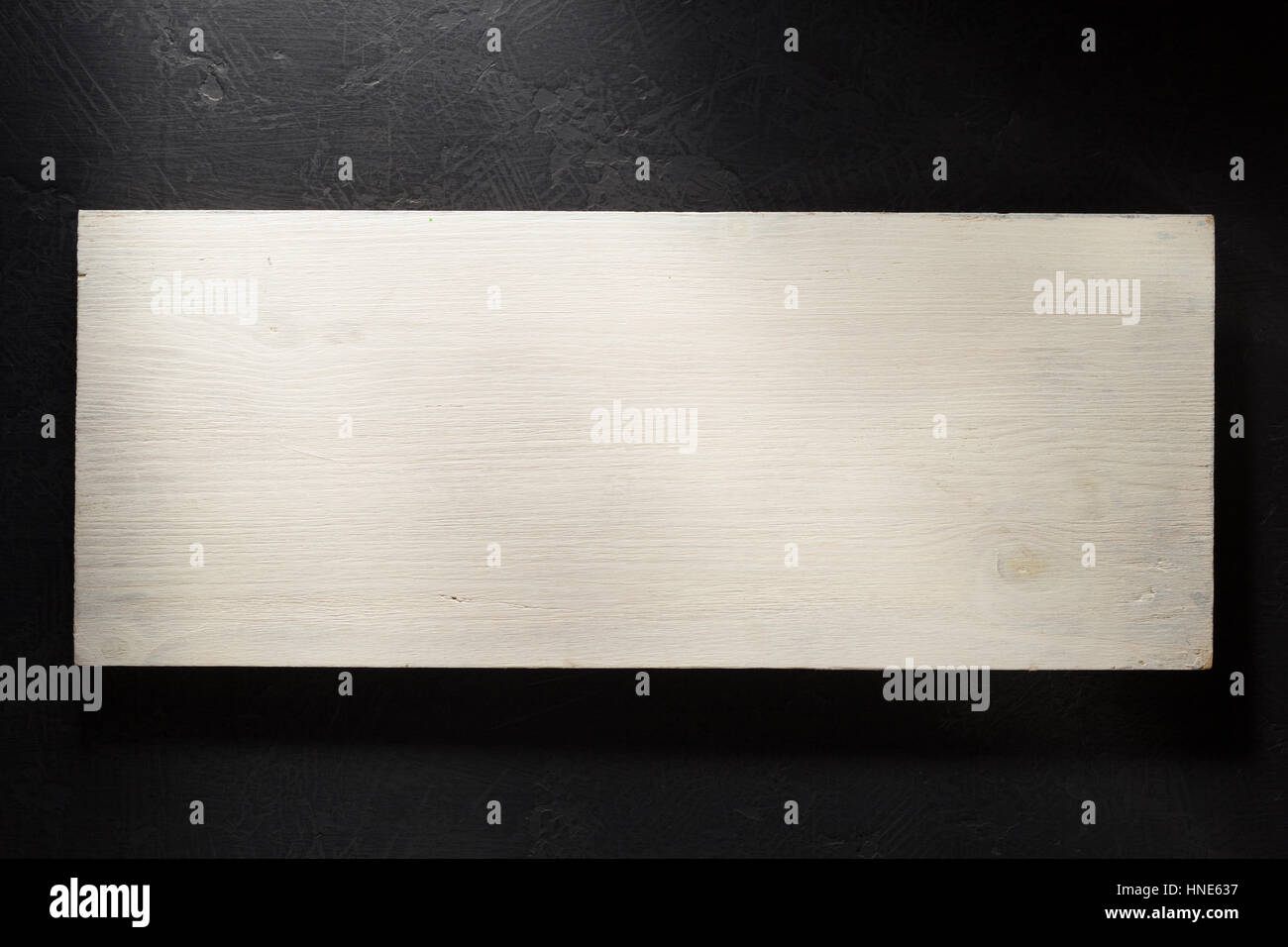 wooden signboard at black background texture Stock Photo - Alamy