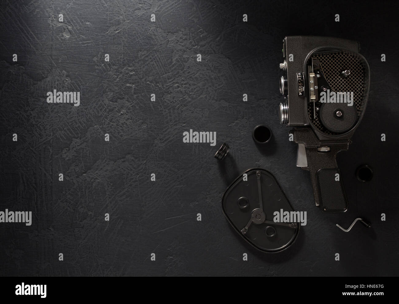 movie camera at black background texture Stock Photo - Alamy