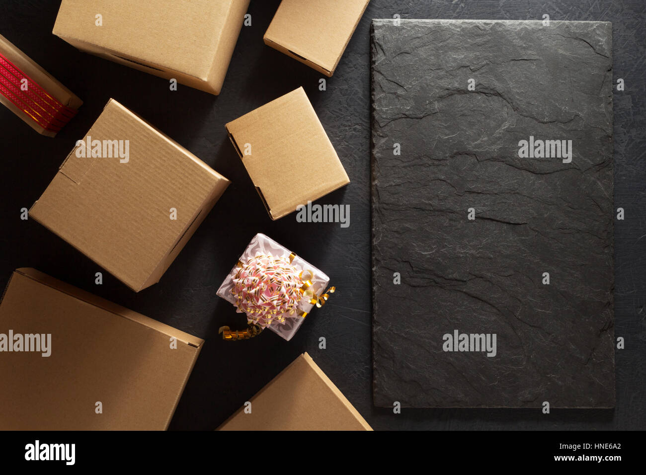 cardboard box on black background Stock Photo - Alamy