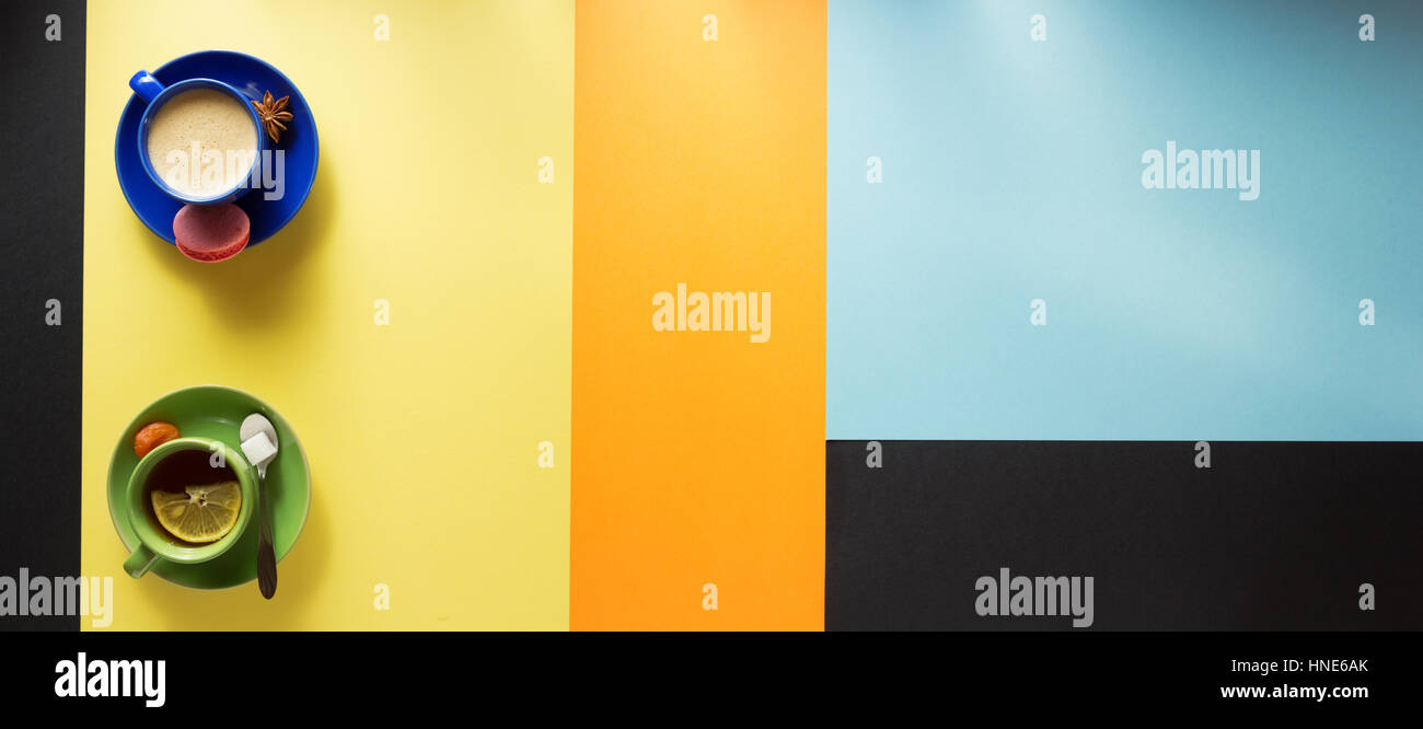 cup of coffee and tea at colorful background Stock Photo - Alamy