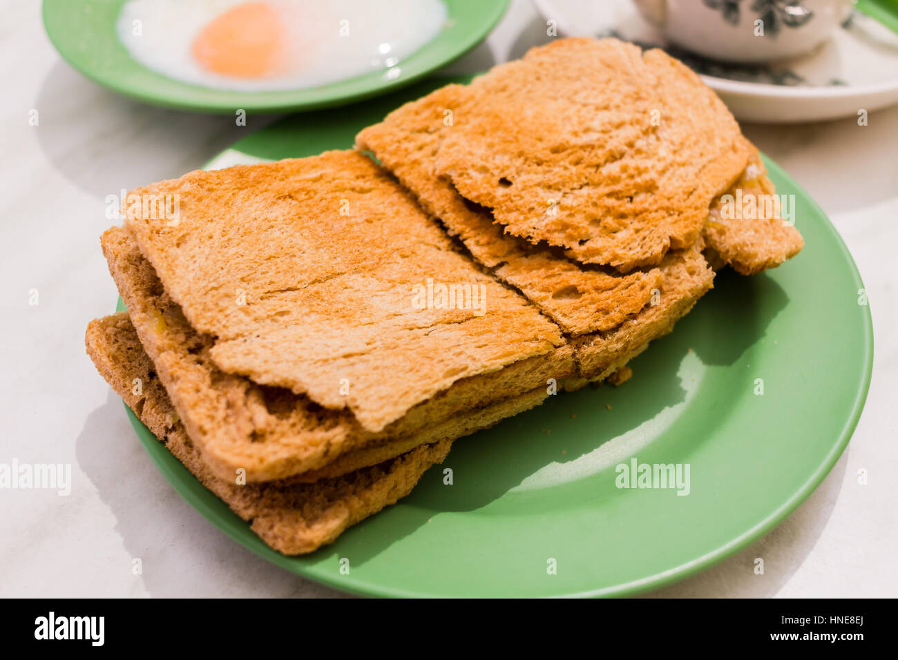 Traditional oriental Chinese coffee in vintage mug and Original bread ...