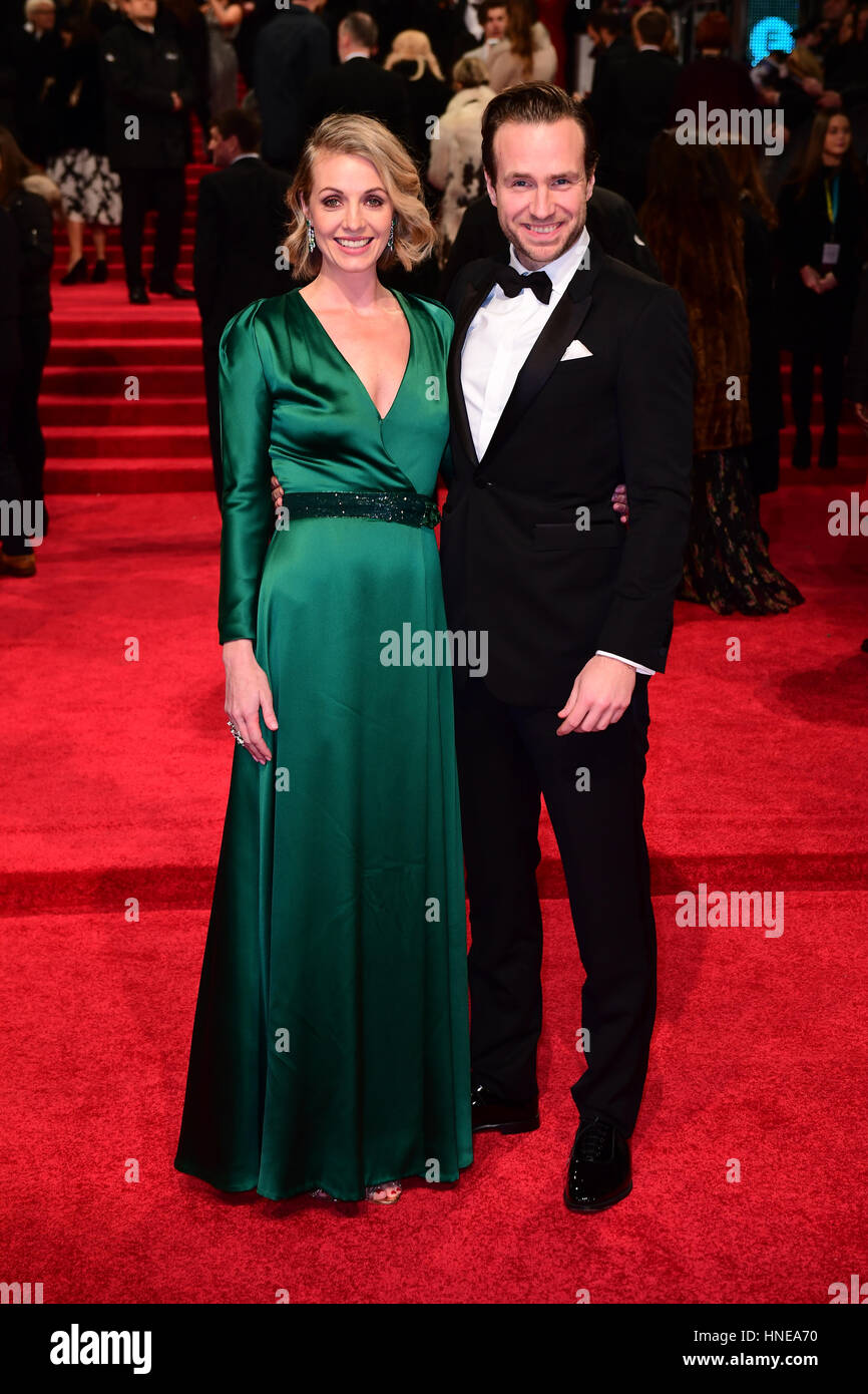Rafe Spall and Elize du Toit attending the EE British Academy Film ...