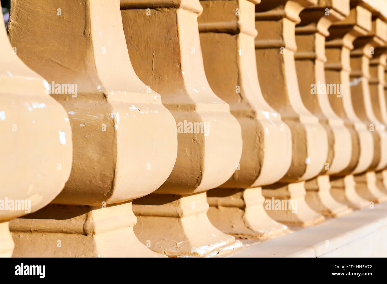 lot of round columns in perspective closeup Stock Photo - Alamy