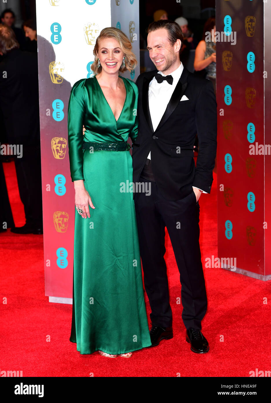 Elize du Toit and Rafe Spall attending the EE British Academy Film ...