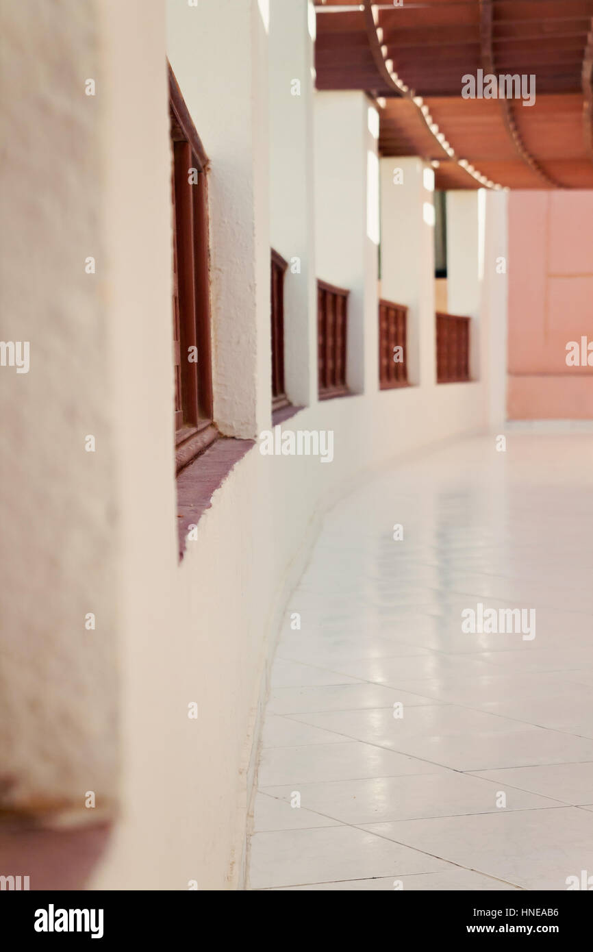 long gallery corridor with columns in perspective Stock Photo - Alamy