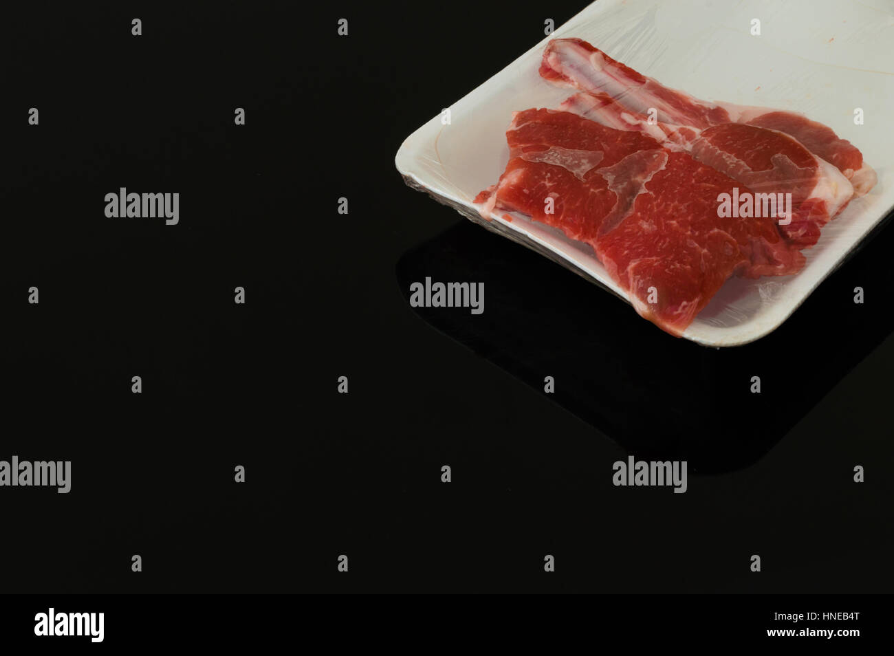 Plastic packaging raw ground beef hi-res stock photography and images ...