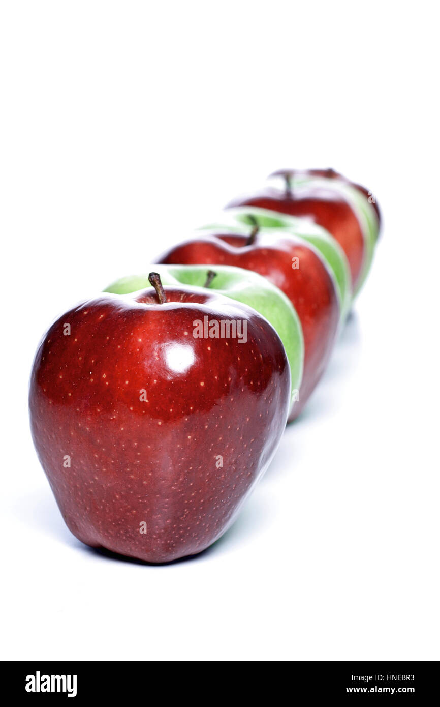 Close-up of apples in row on white background Stock Photo - Alamy