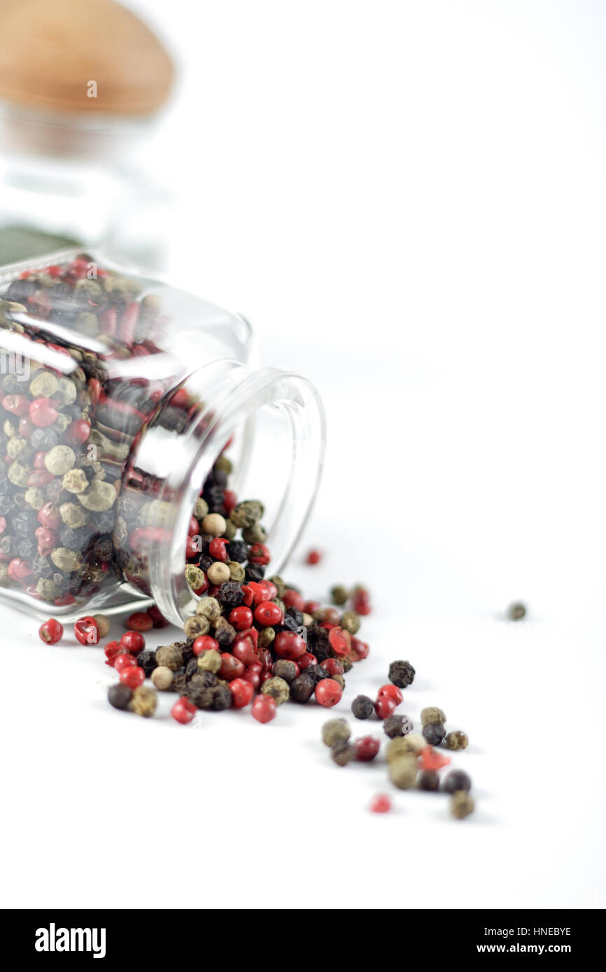 Mixed pepper seeds of various colours red black green Stock Photo - Alamy