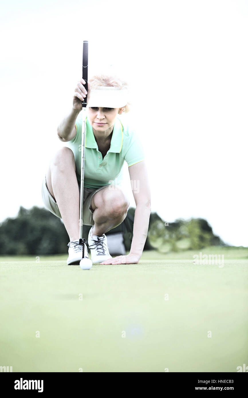 Woman aiming hi-res stock photography and images - Alamy