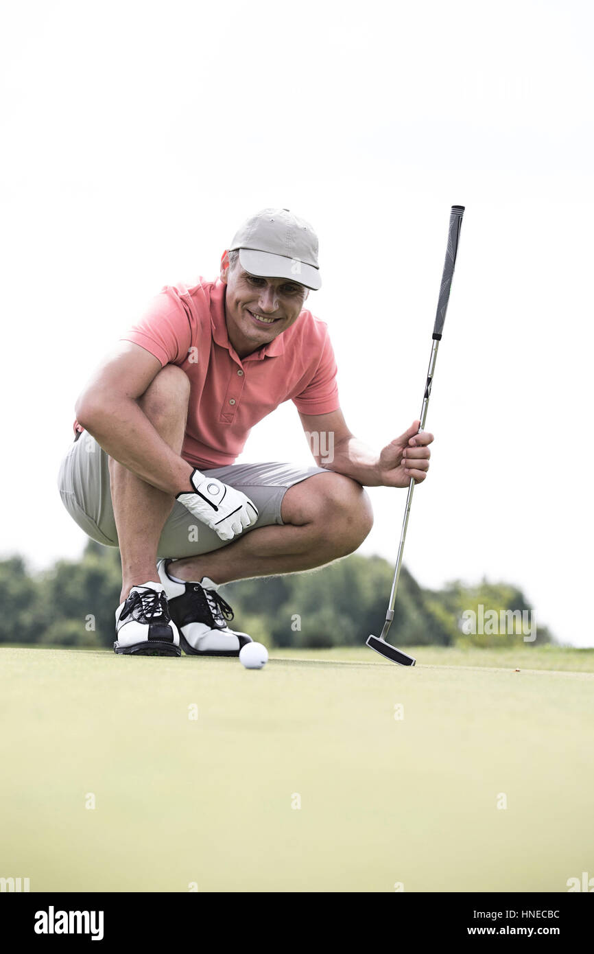 Man Crouching Playing Golf High Resolution Stock Photography and Images ...