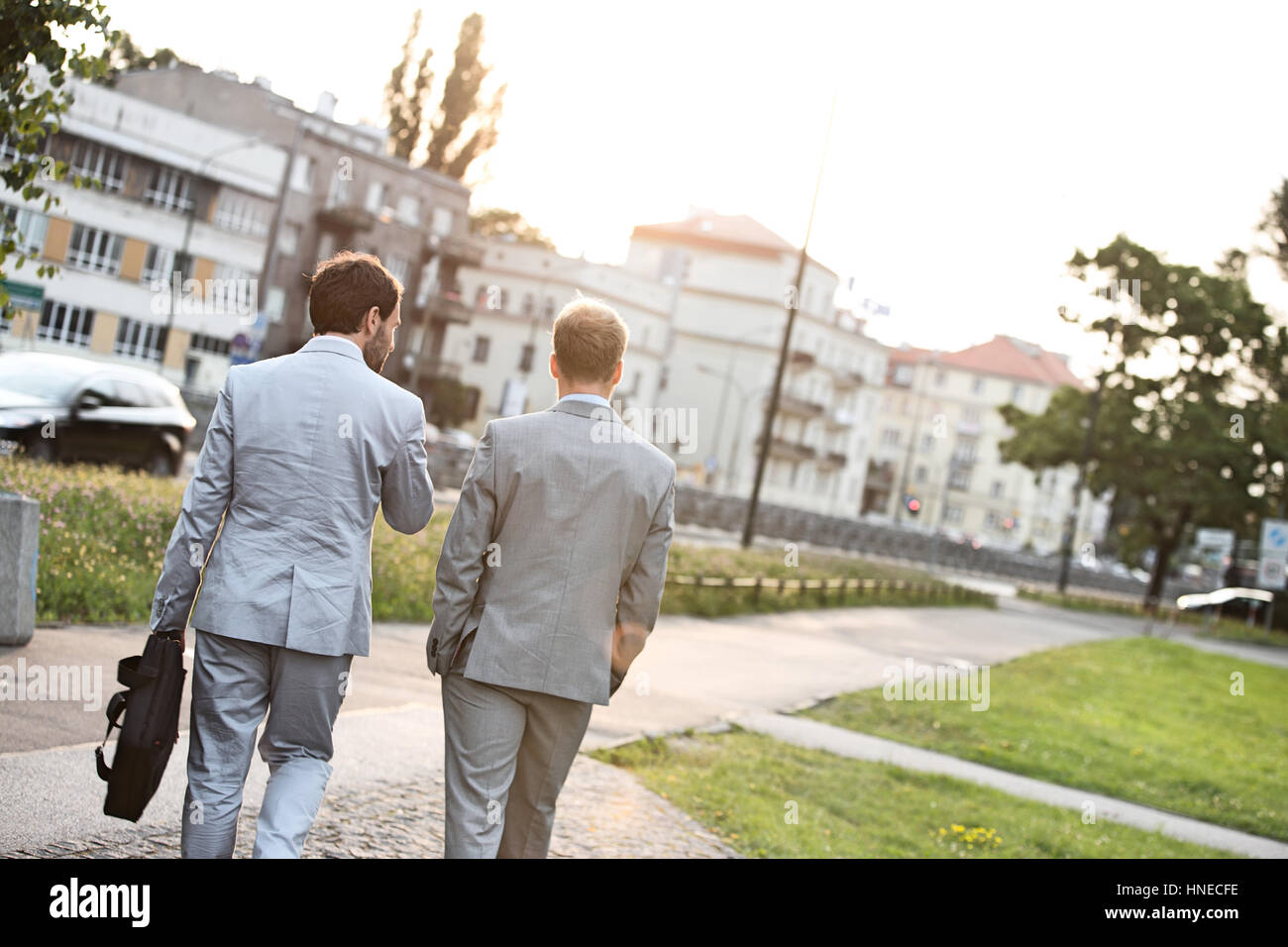 Two businessmen walking outdoors hi-res stock photography and images ...