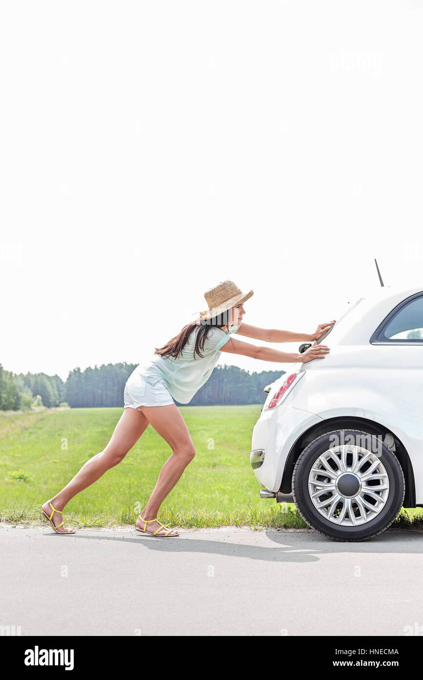 Pushing automobile hi-res stock photography and images - Alamy